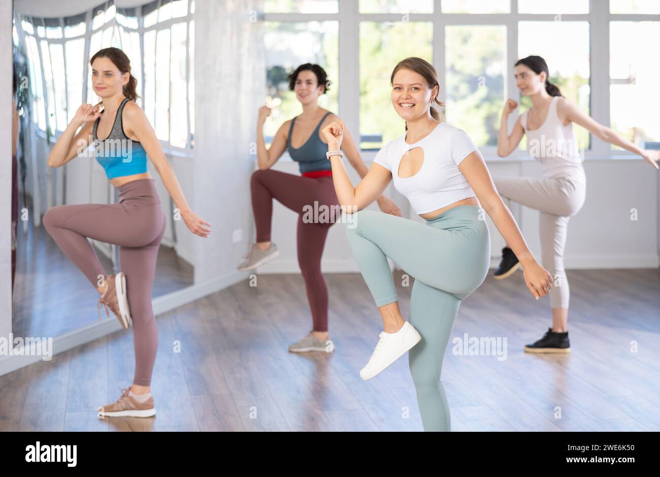 Slender young women dancers dance twist in modern way Stock Photo - Alamy