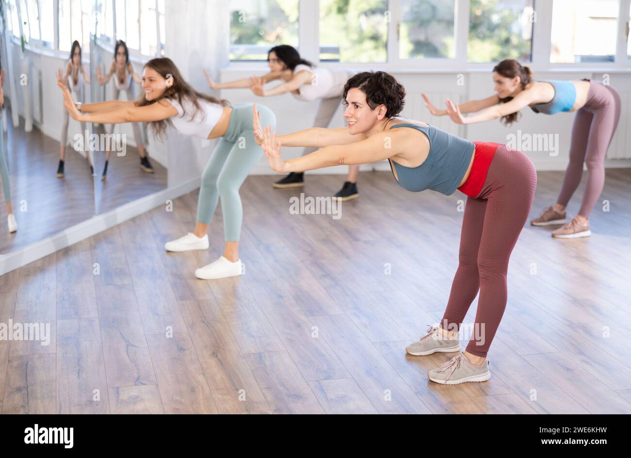 Female teacher conducts modern dance lessons for group of girls Stock ...