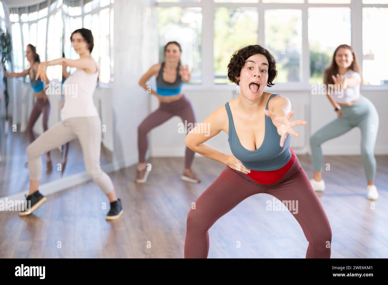 Female teacher conducts modern dance lessons for group of girls Stock ...