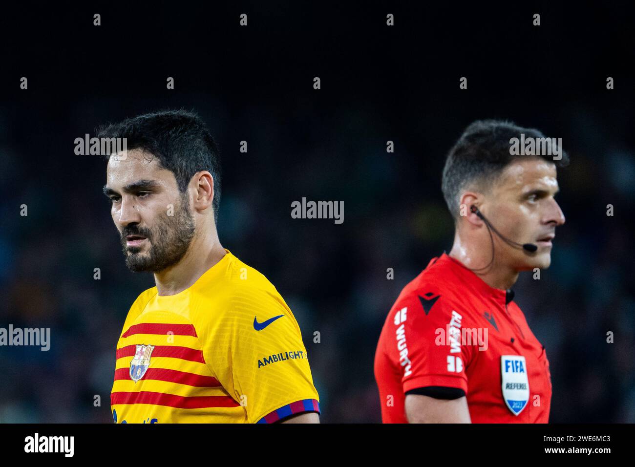 Ilkay gundogan (L) of FC Barcelona and referee Jesus Gil Manzano (R ...