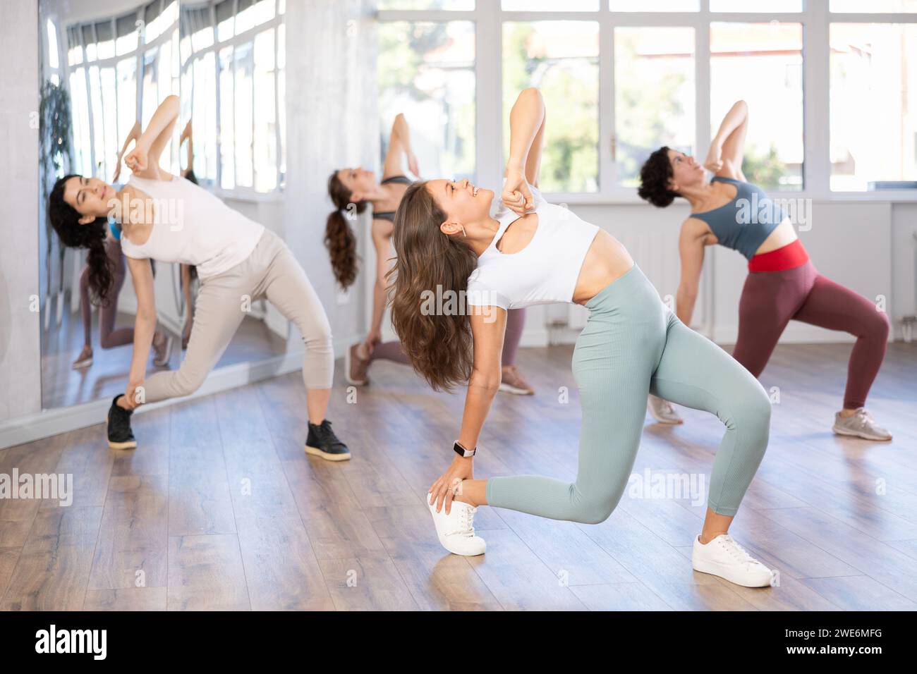 Group of women dancing dancehall in studio Stock Photo - Alamy