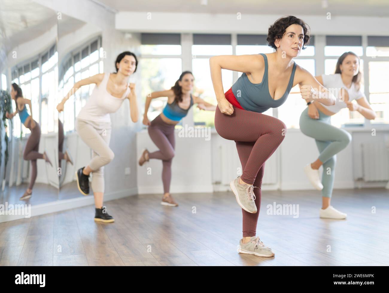 Female teacher conducts modern dance lessons for group of girls Stock ...