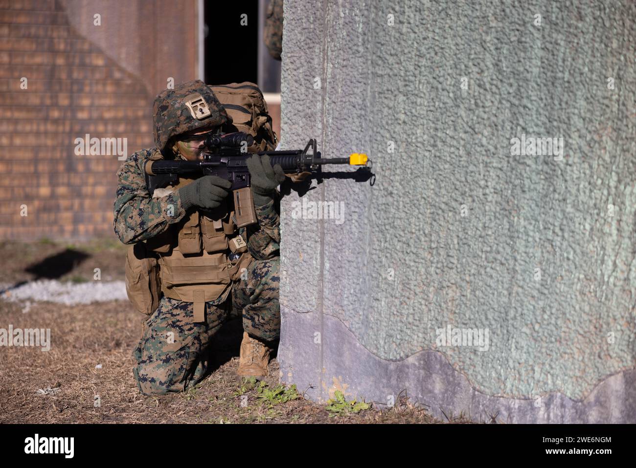 A U.S. Marine with 2d Marine Division Band provides security at an ...