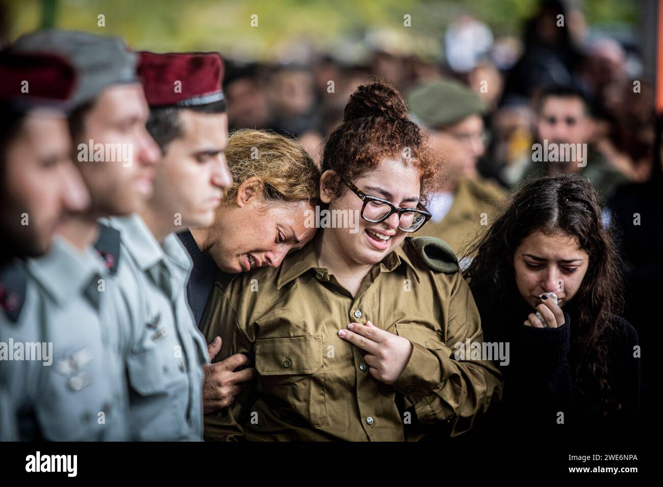 Family members weep during the funeral ceremony of Major Ilay Levy at ...