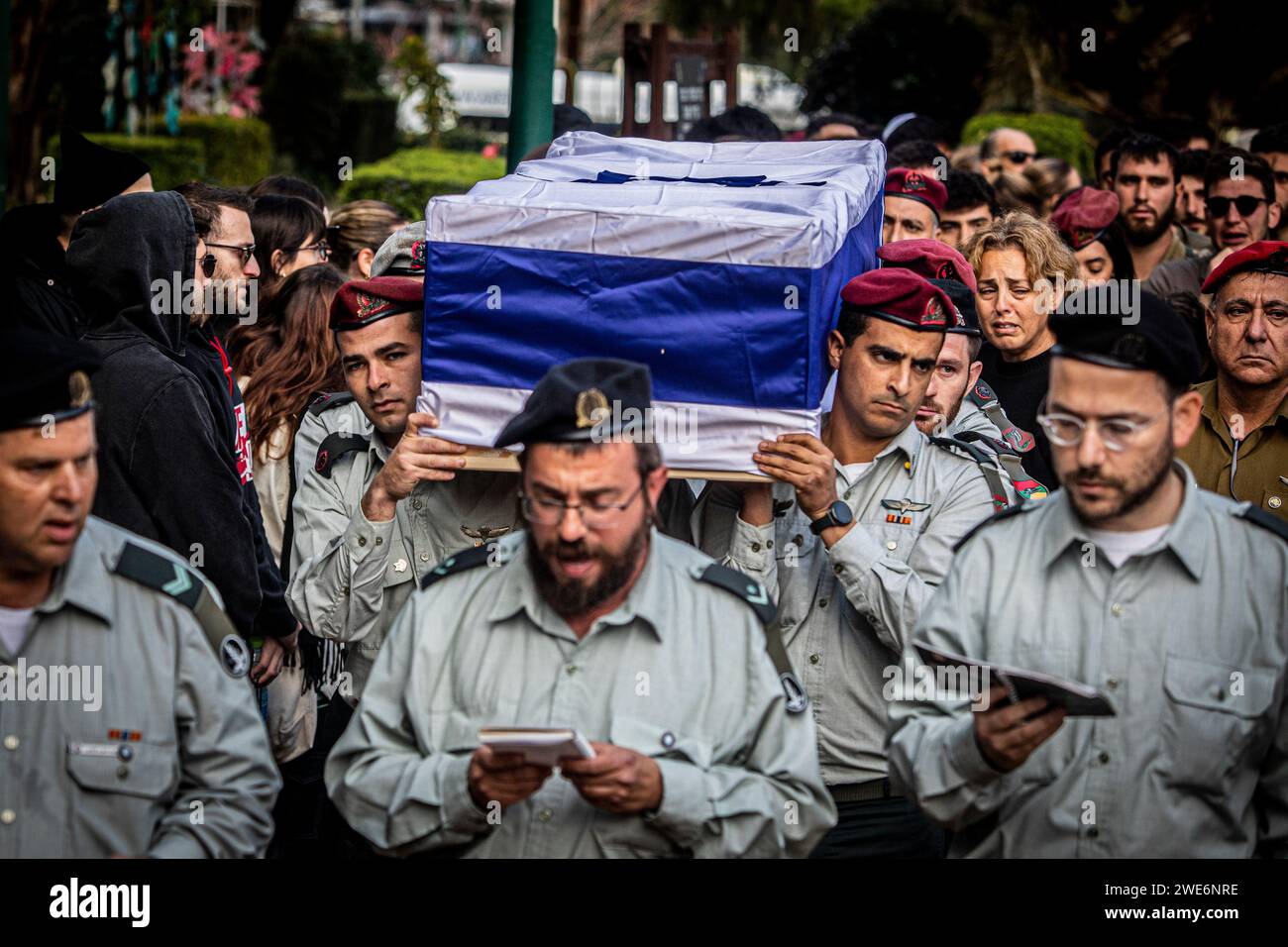 Israeli officers carry the coffin of Major Ilay Levy during his funeral ...