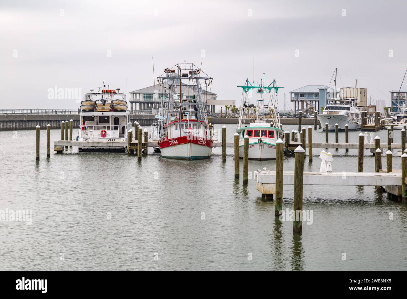 Commerial shrimp and fishing boats docked in the harbor at Pass ...