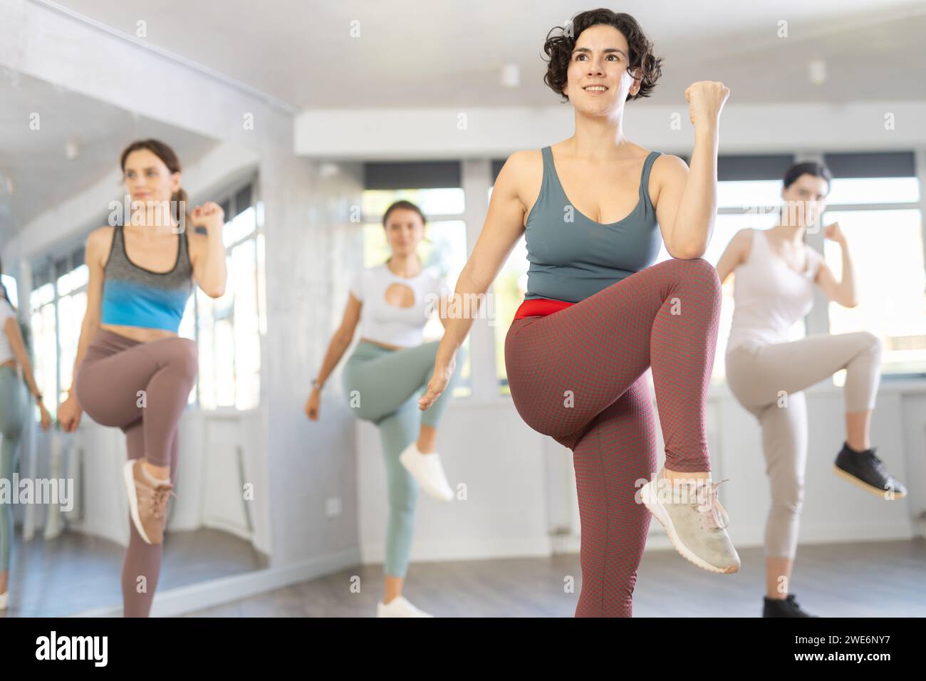 Female teacher conducts modern dance lessons for group of girls Stock ...