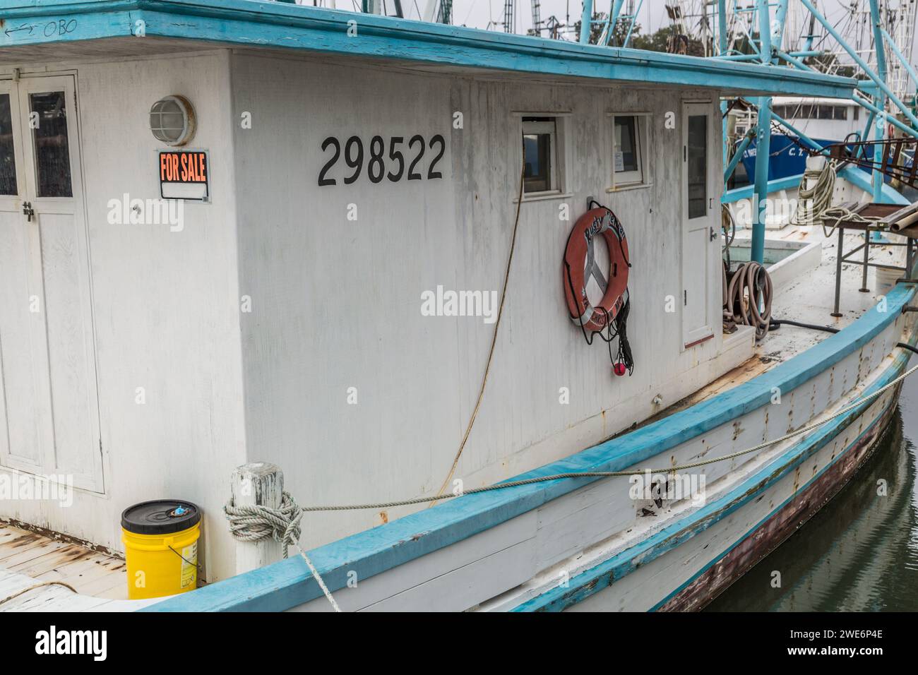 Old commerial fishing boat for sale while docked in the harbor at Pass ...