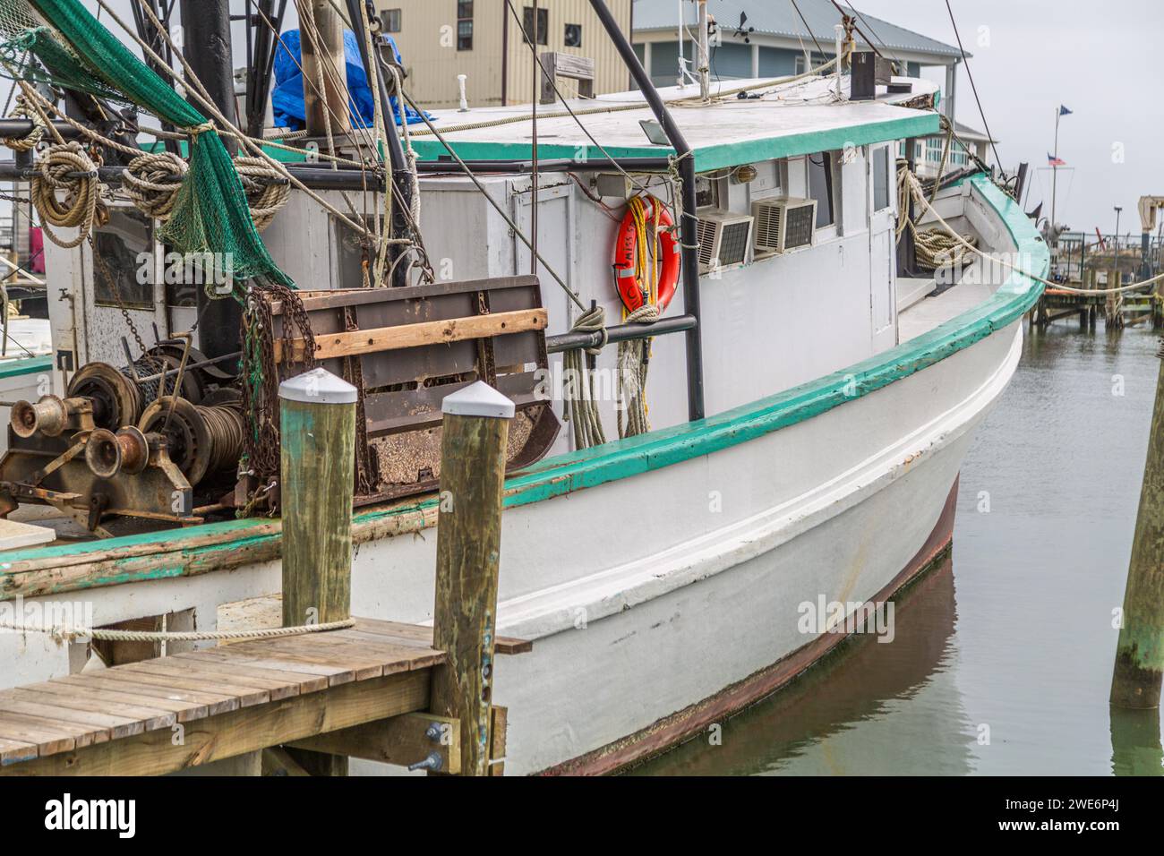 Commerial shrimp boat docked in the harbor at Pass Christian ...