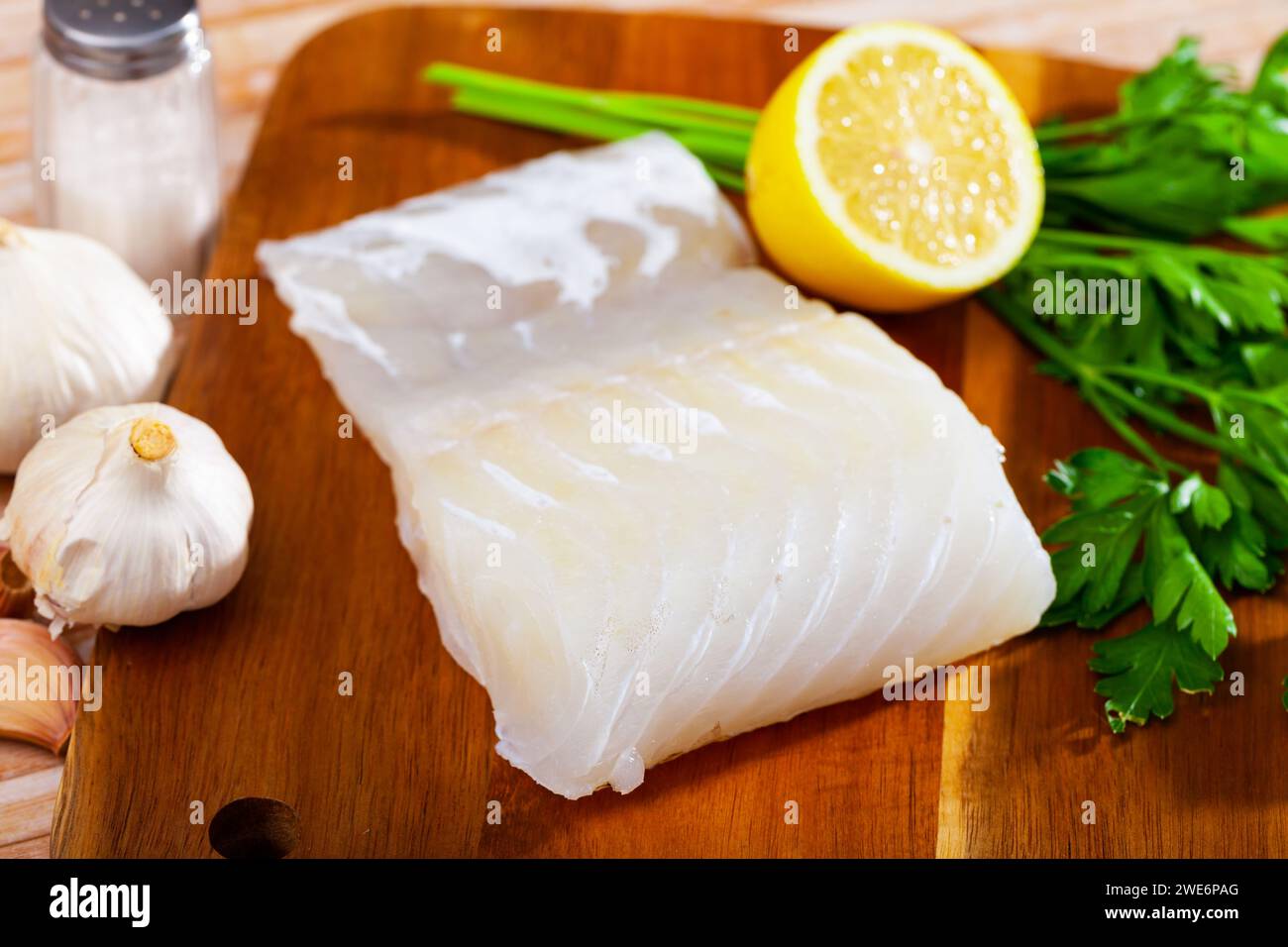Raw pink cusk-eel fish fillet, seafood ingredients Stock Photo - Alamy