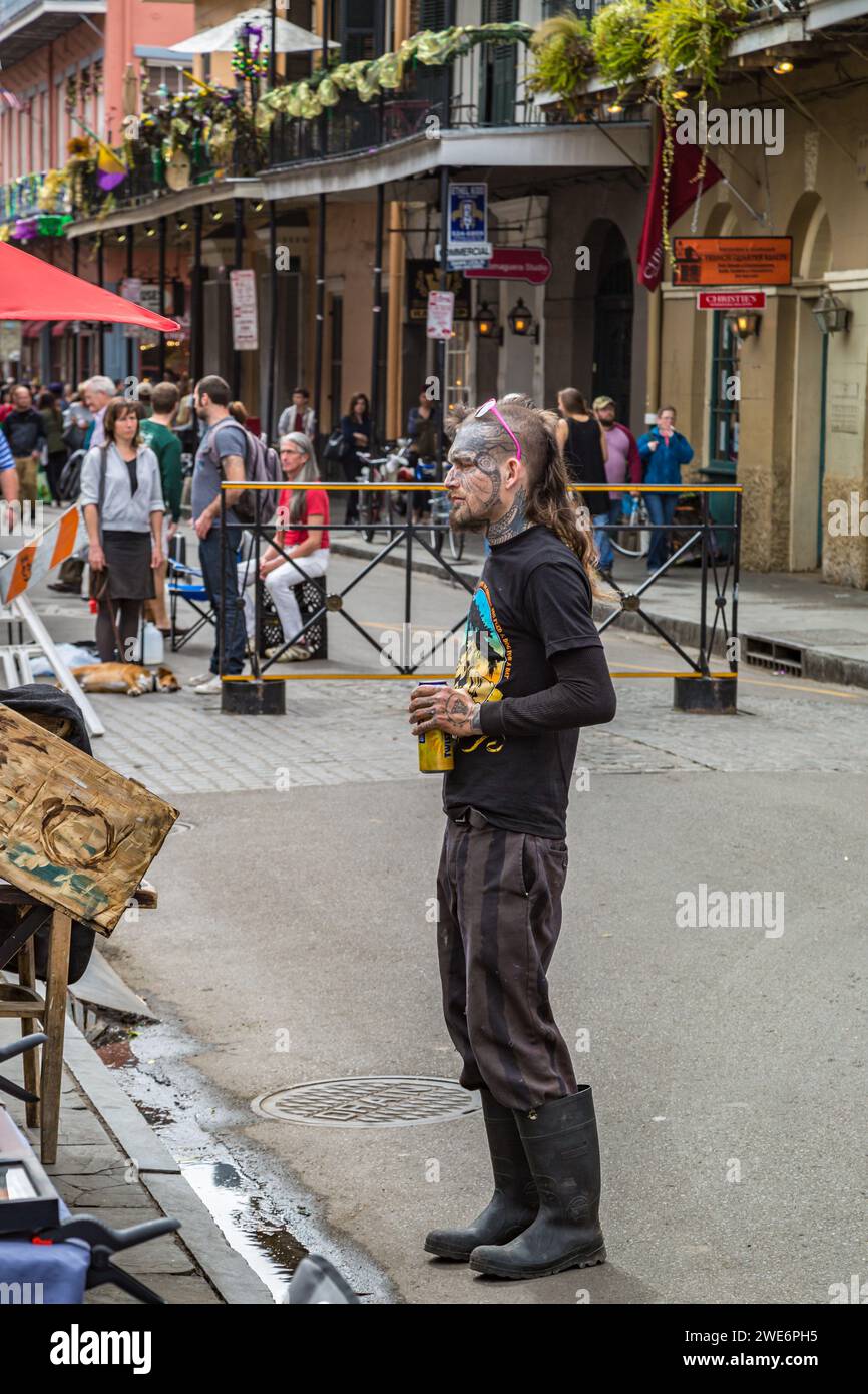 Strange looking man with face tatoos on the street in the French ...