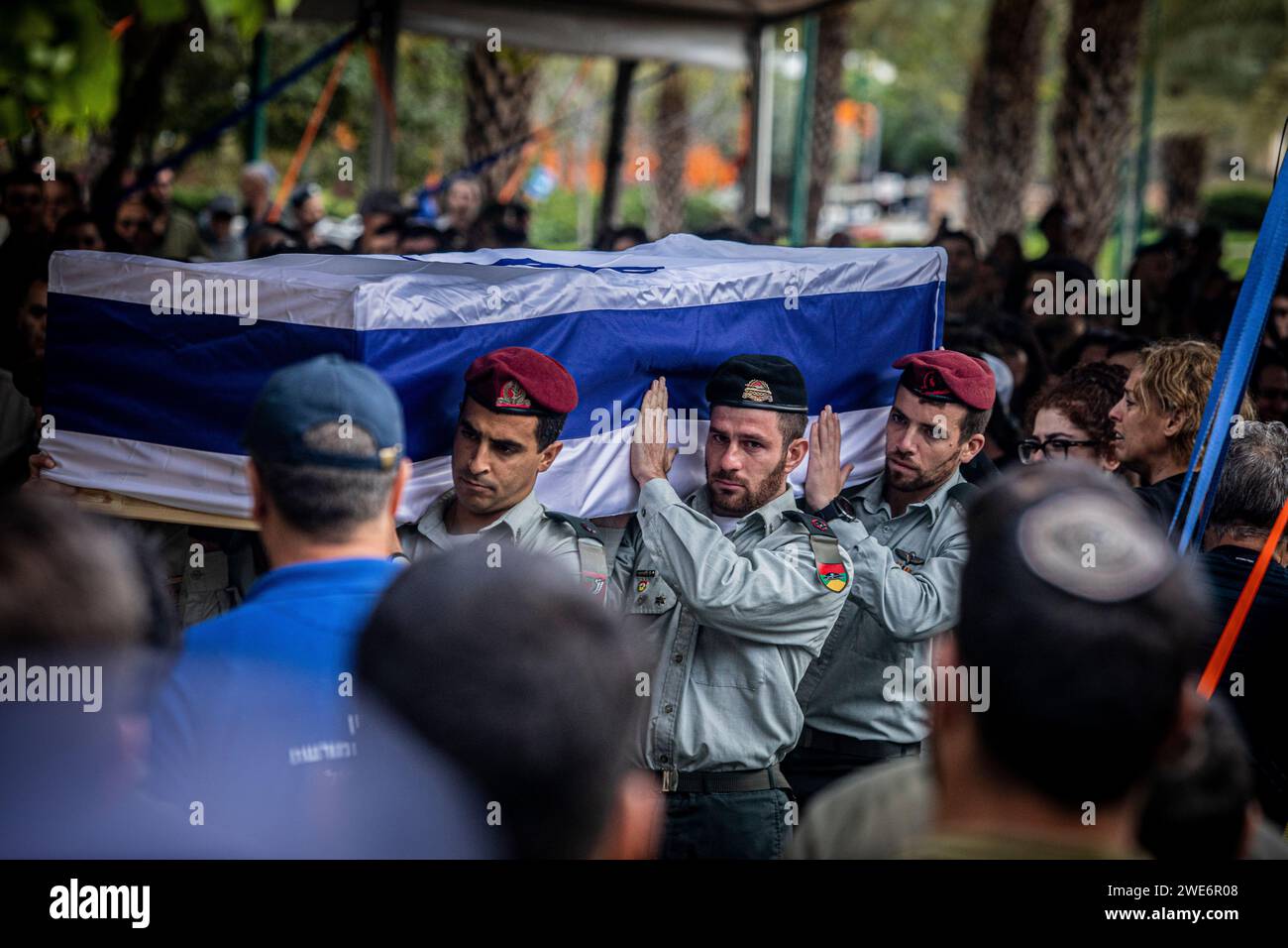 Israeli officers carry the coffin of Major Ilay Levy during his funeral ...