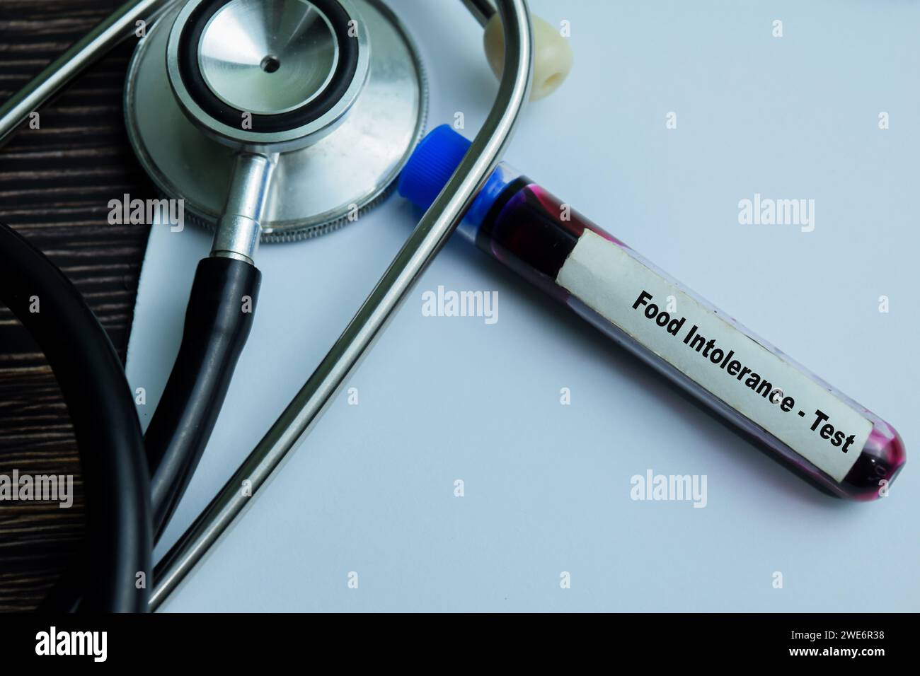 Food Intolerance - Test with blood sample on wooden background ...