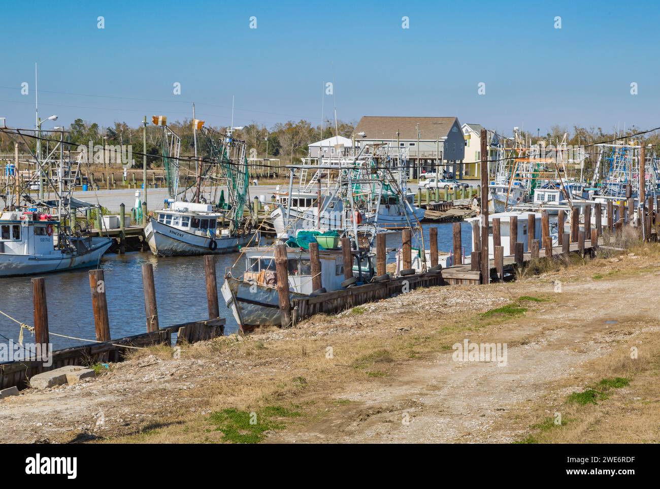 Commercial fishing and shrimp boats docked at Bayou Caddy Fisheries in ...