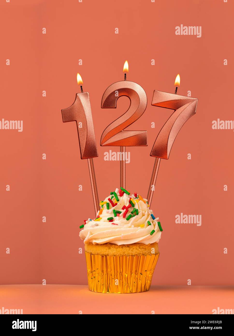Candle number 127 - Cupcake birthday in coral fusion background Stock ...