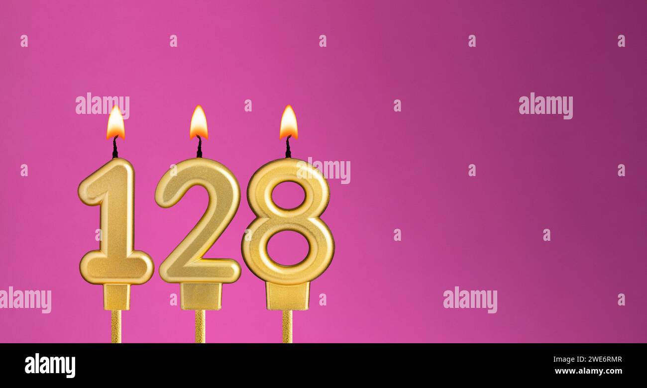 Candle number 128 in purple background - birthday card Stock Photo - Alamy