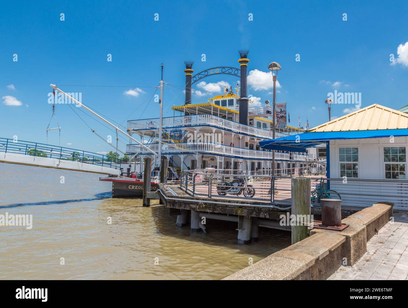 Historic Creole Queen paddlewheel riverboat at dock on the Mississippi ...