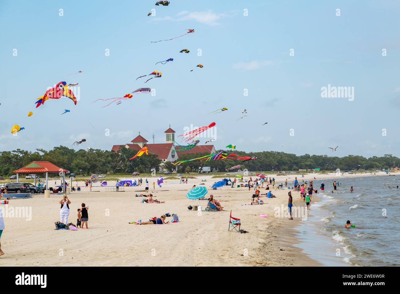 Kites flying over the man-made sand beach in Long Beach, Mississippi ...