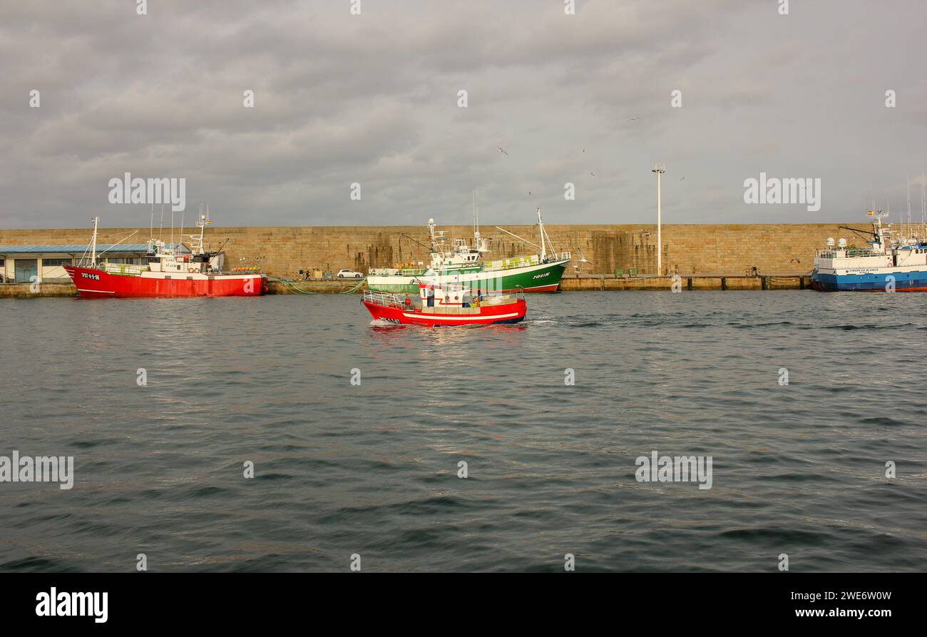 Burela, Spain ;10 12 2023 : some ships in the port of Burela, Spain ...