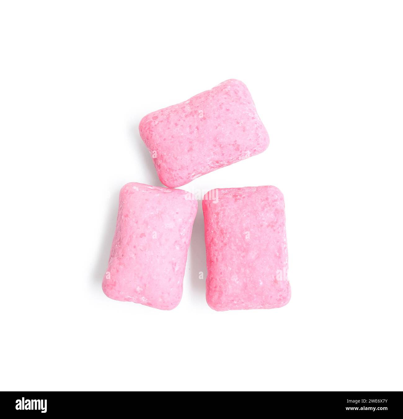 Pink chewing gums on white background Stock Photo - Alamy