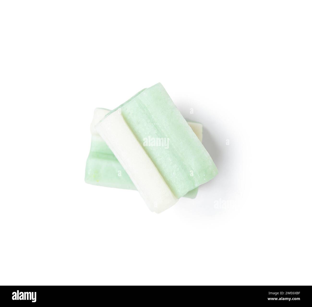 Green chewing gums on white background Stock Photo - Alamy