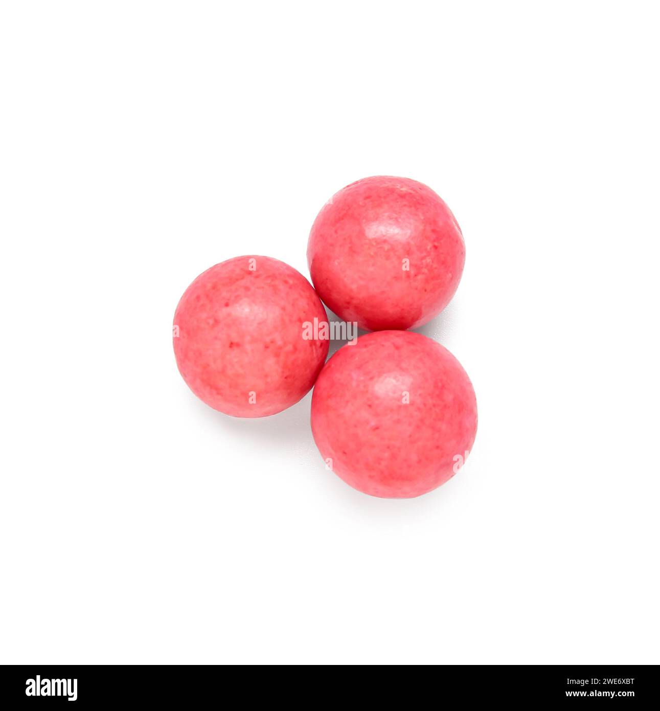 Red chewing gums on white background Stock Photo - Alamy