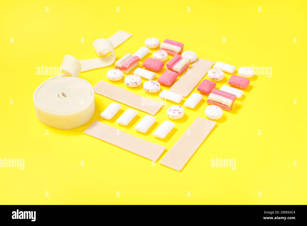 Many different chewing gums on yellow background Stock Photo - Alamy