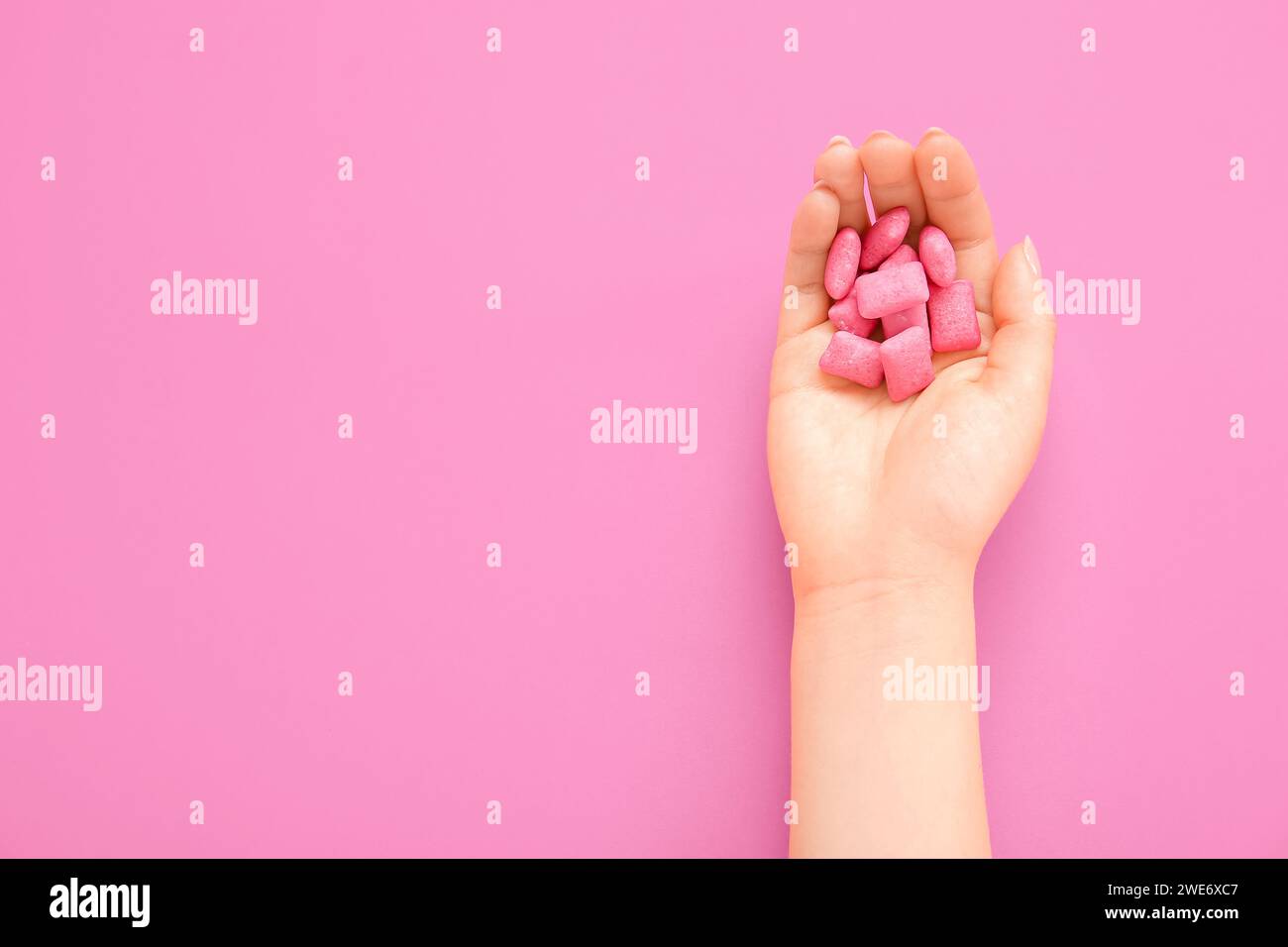 Female hand chewing gums hi-res stock photography and images - Alamy