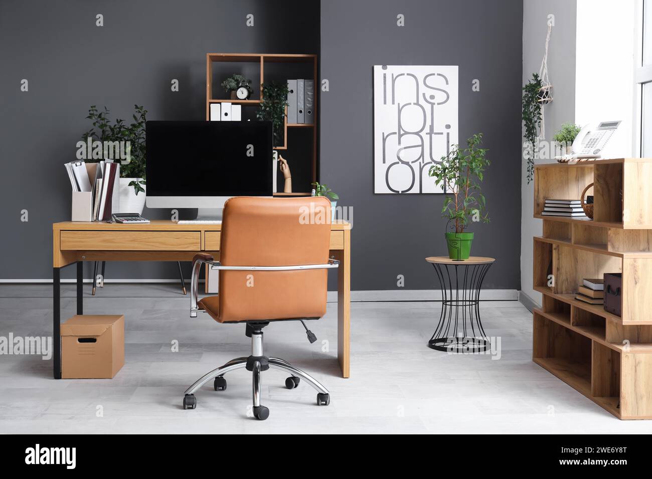 Interior of modern office with workplace and shelf units Stock Photo ...