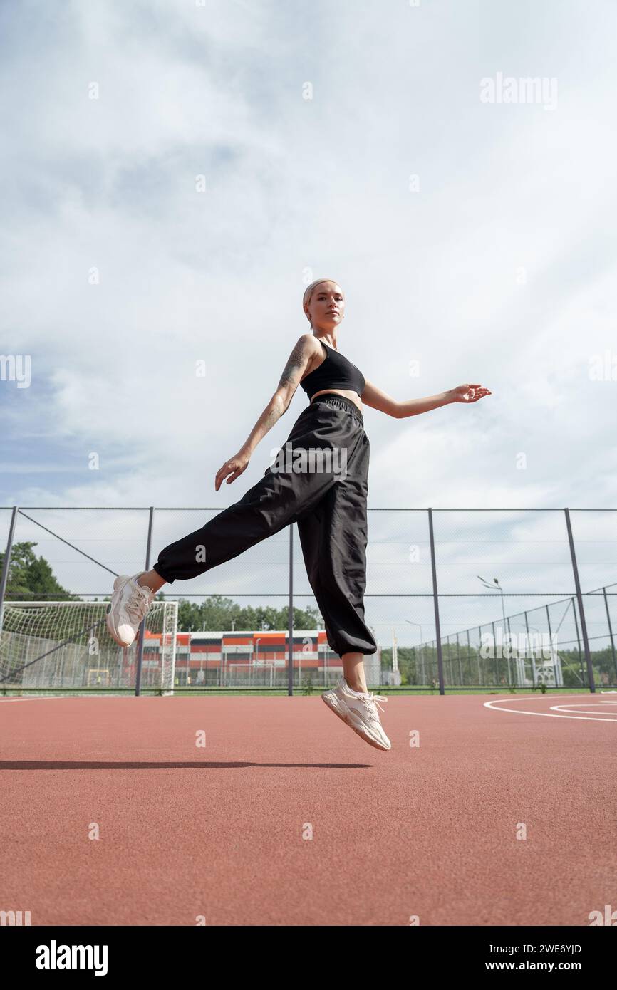 Woman captured in dynamic motion hi-res stock photography and images ...