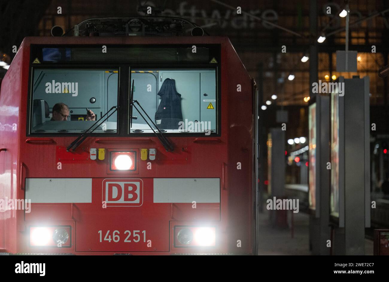 24 January 2024, Hesse, Frankfurt/Main: A train stands on a track at ...