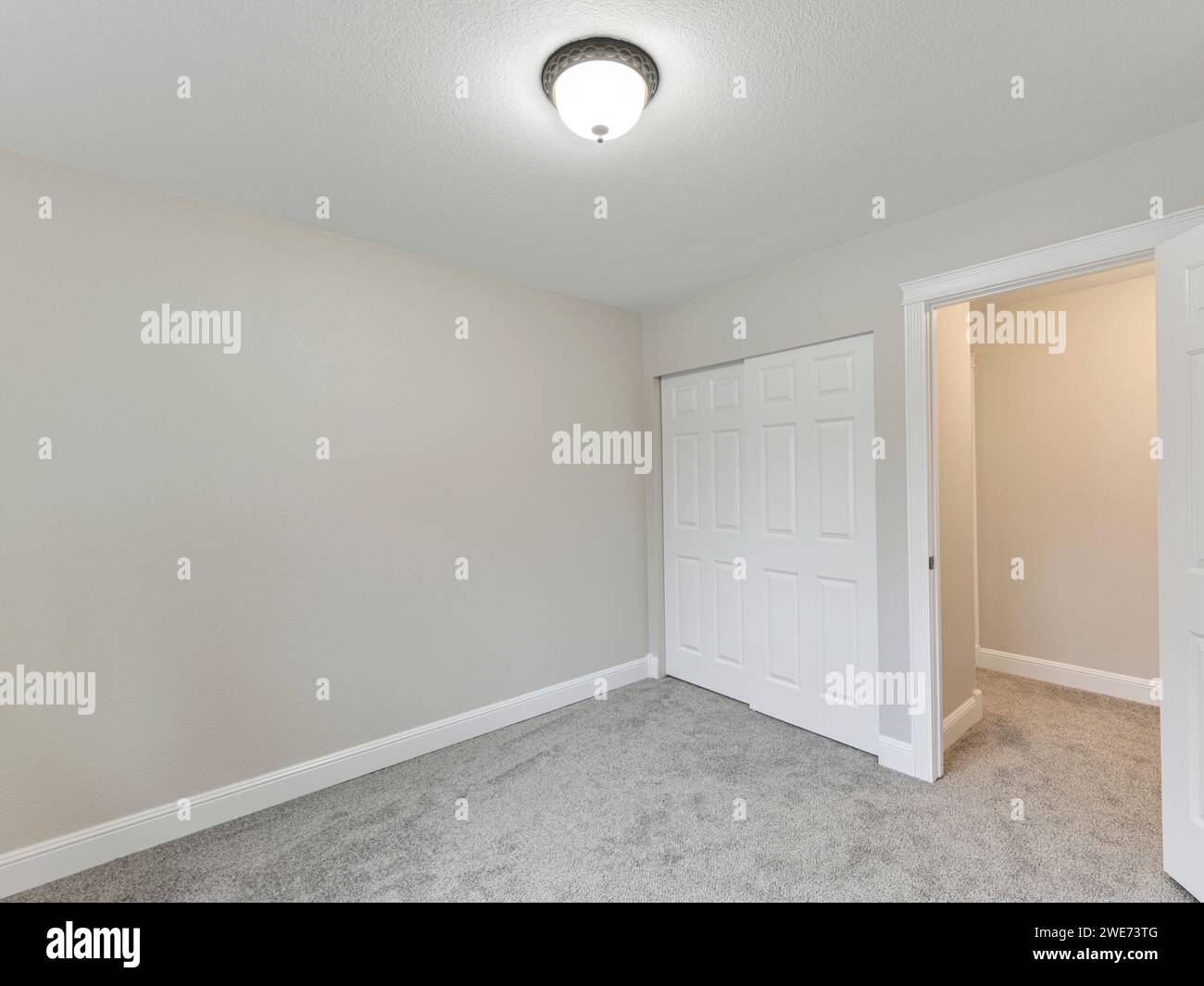 Modern residential empty bedroom interior Stock Photo - Alamy