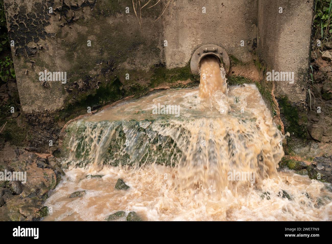 Effluent discharge from a factory Stock Photo - Alamy