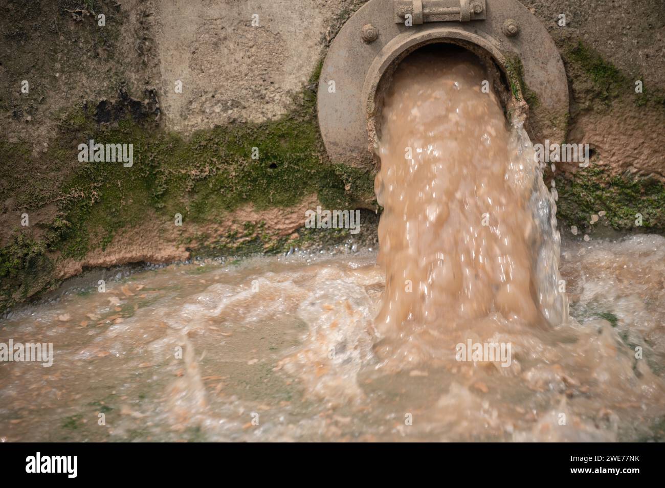 Effluent discharge from a factory Stock Photo - Alamy