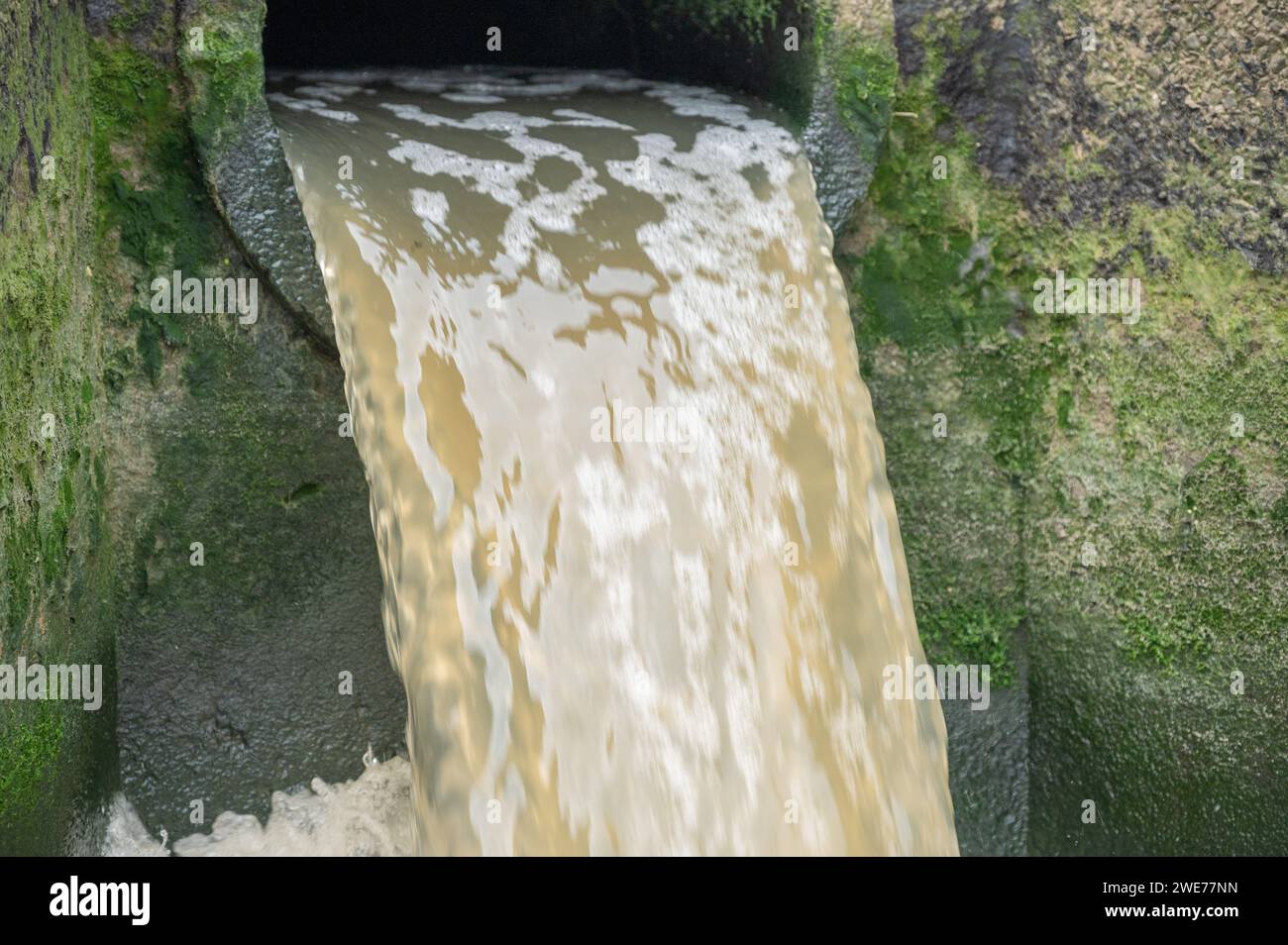 Effluent discharge from a factory Stock Photo - Alamy