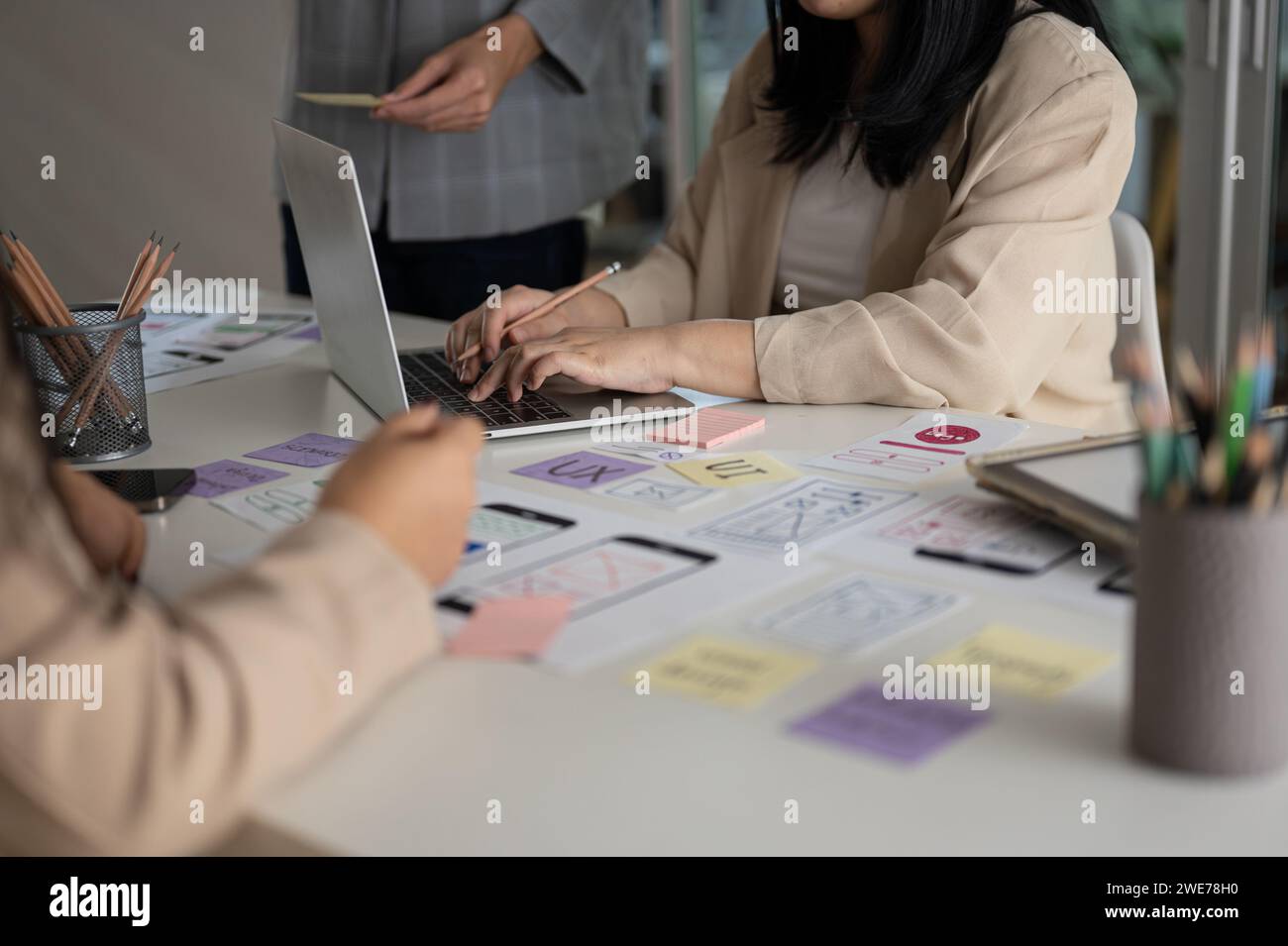 Group of busy, creative graphic designer in the meeting, brainstorming ...