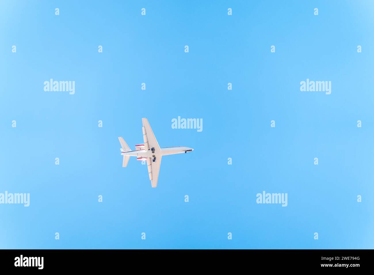 Airplane Cessna 680 before landing in blue sky. Airplane type Cessna ...