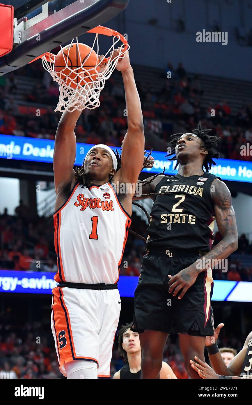 Syracuse forward Maliq Brown, left, dunks in front of Florida State ...