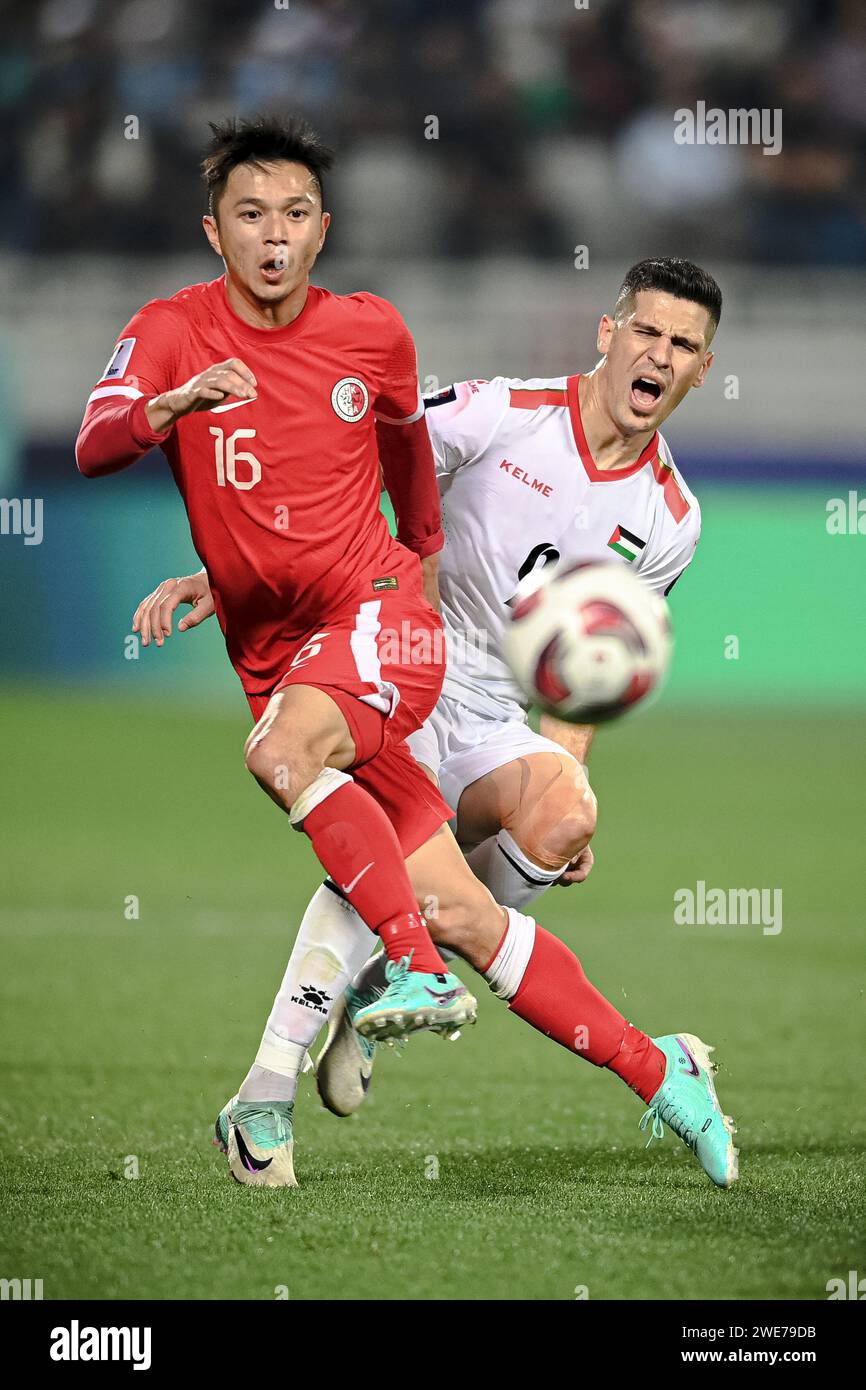 Doha, Qatar. 23rd Jan, 2024. Chan Siu Kwan Philip (L) of China's Hong ...