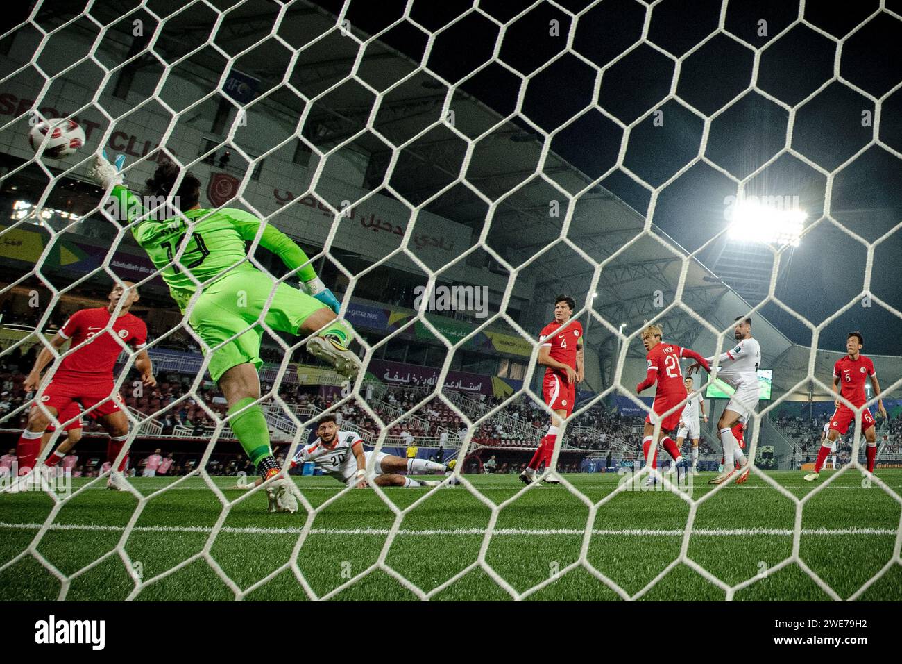 Doha, Qatar. 23rd Jan, 2024. Tse Ka Wing (2nd L), goalkeeper of China's ...