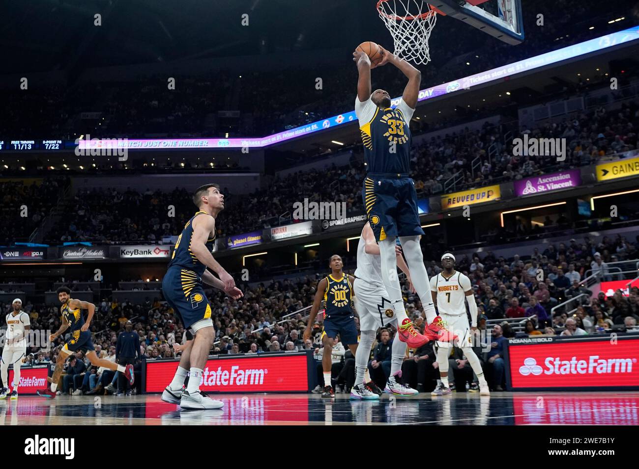 Indiana Pacers' Myles Turner (33) dunks during the second half of an ...