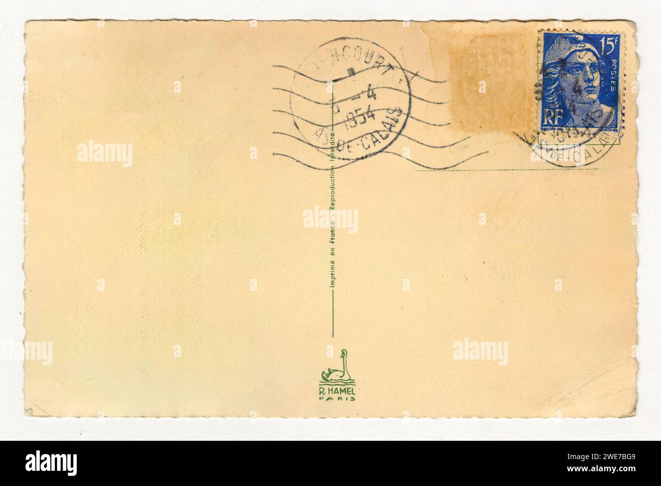 Blank vintage postcard back with blue 15 franc postage stamp with head ...