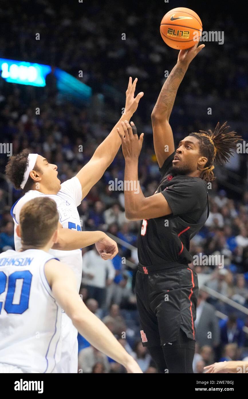 Houston forward Ja'Vier Francis (5) shoots as =BYU center Aly Khalifa ...
