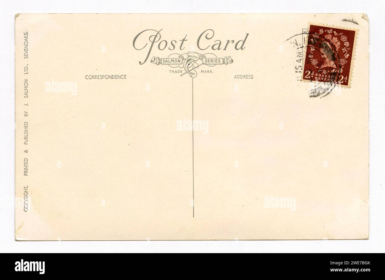Blank vintage postcard back with dark red 2 shilling British postage ...