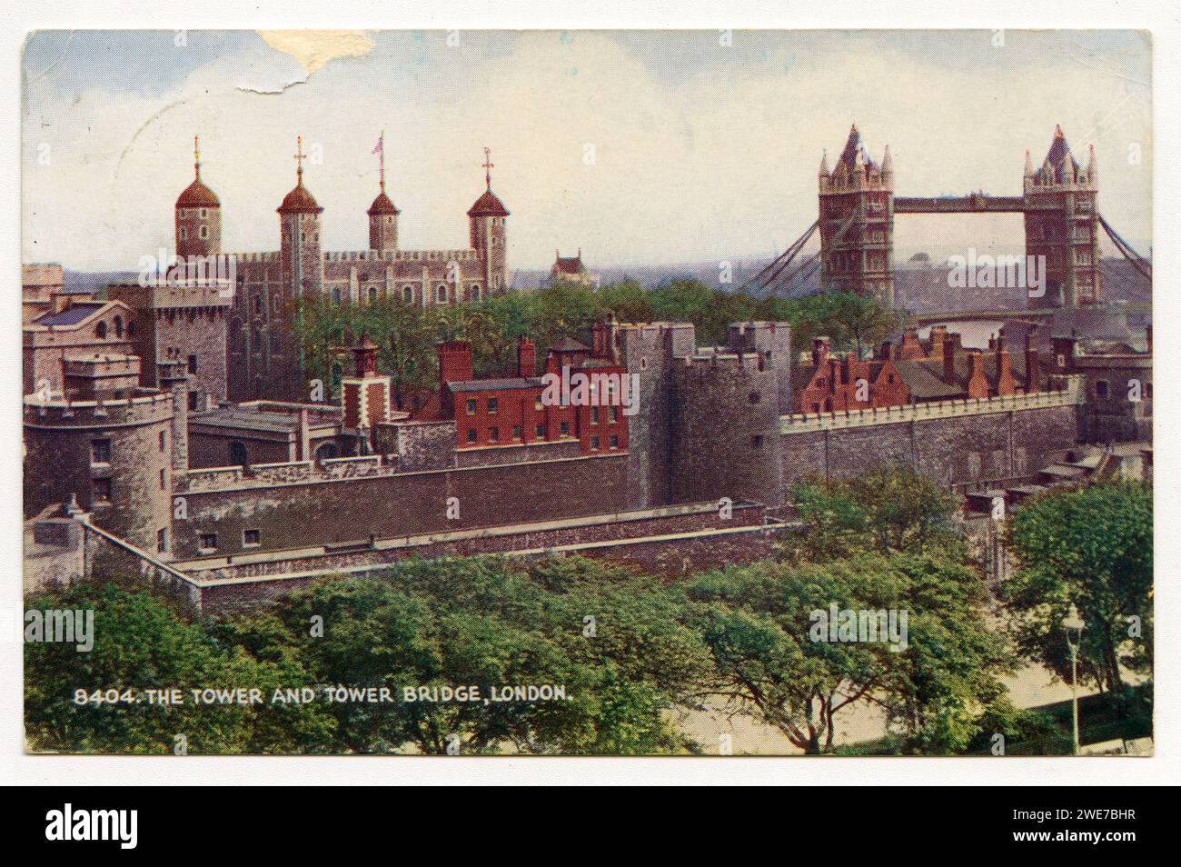 Hand-coloured postcard view of the Tower of London and Tower Bridge ...