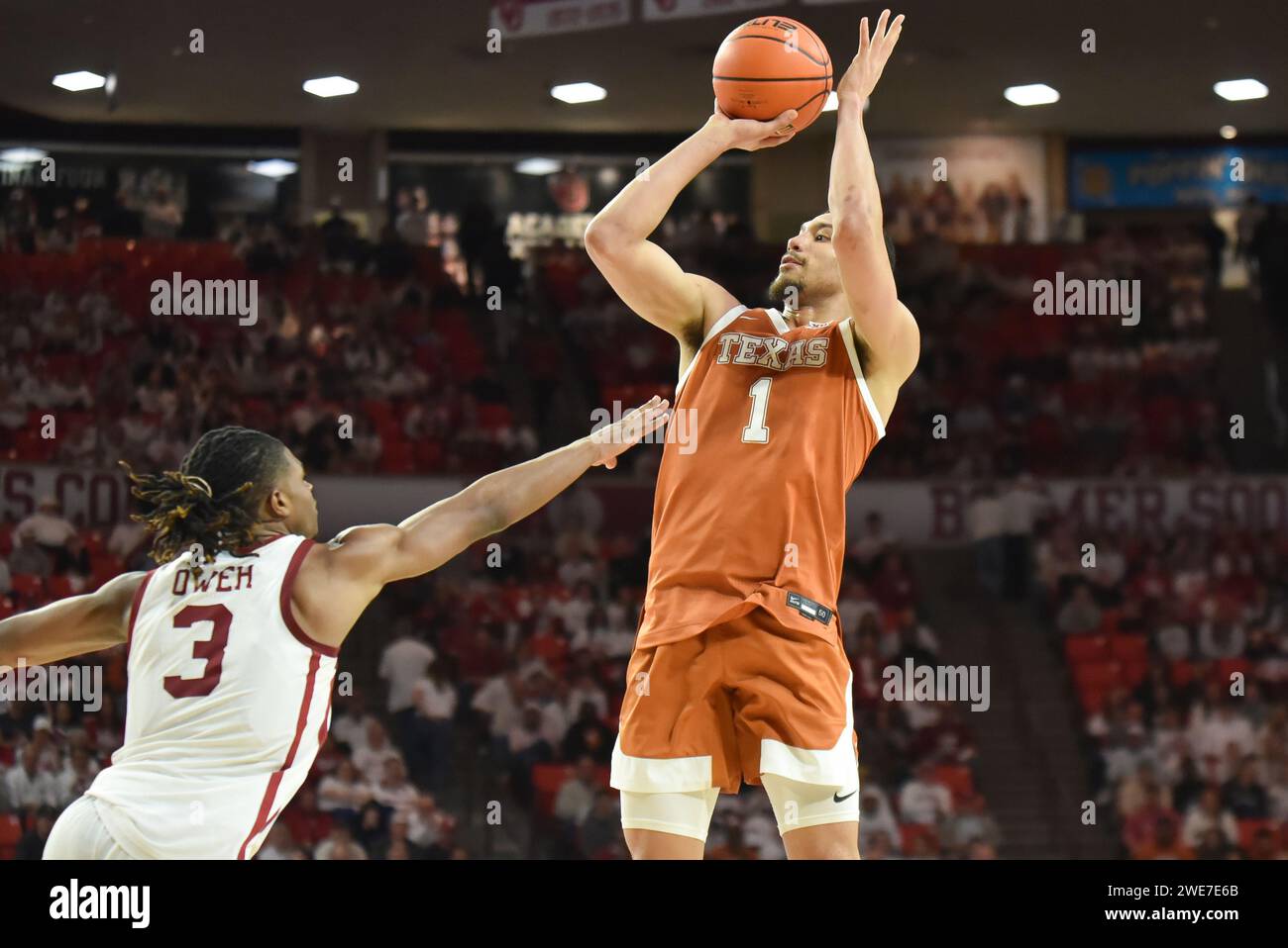 Texas forward Dylan Disu (1) shoots over Oklahoma guard Otega Oweh (3 ...