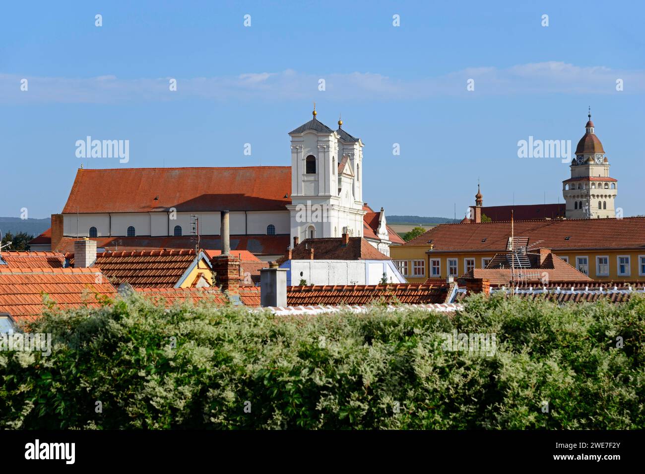Town view with church and historical buildings under clear blue sky ...