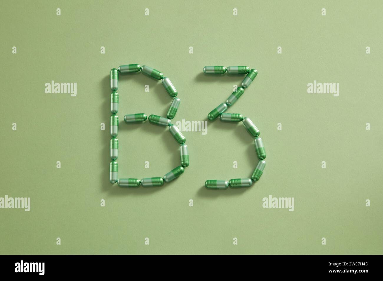 Many pills forming shape B3. Vitamin B3 capsules. Medicine vitamins and ...