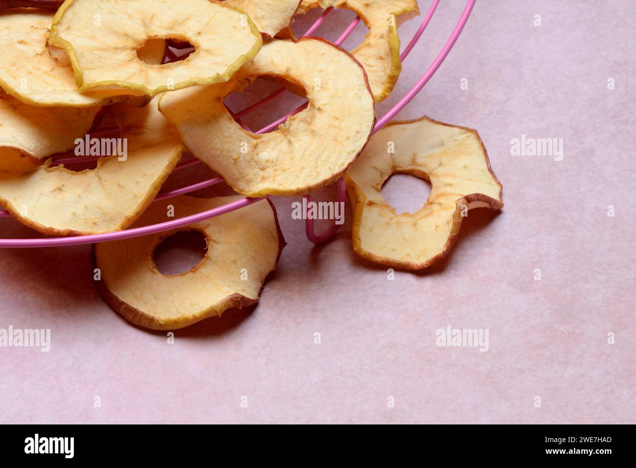 Dried apple rings on a grid, dried fruit Stock Photo - Alamy