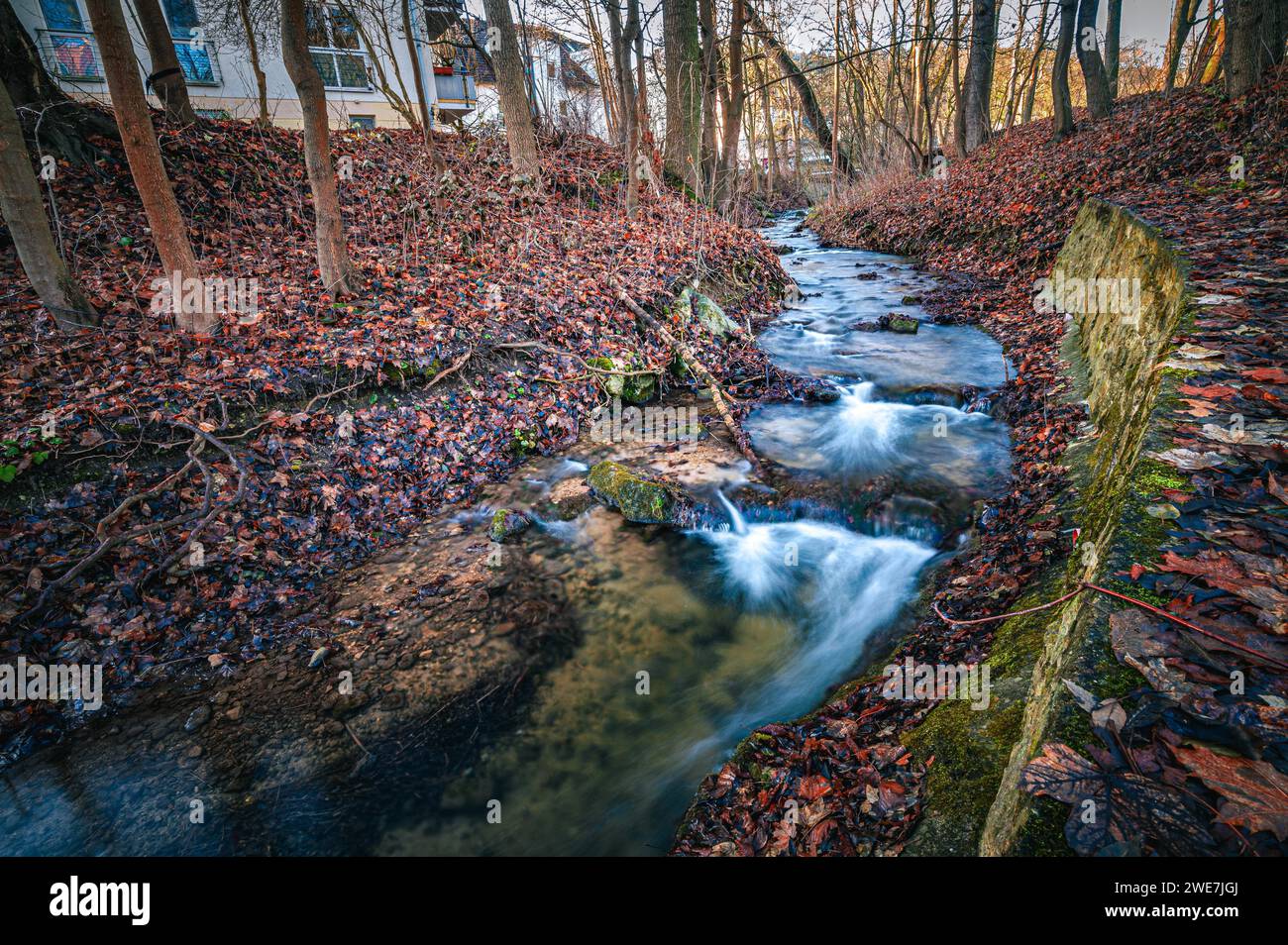 Long exposure of the river Leutra in the Jena West district flowing ...